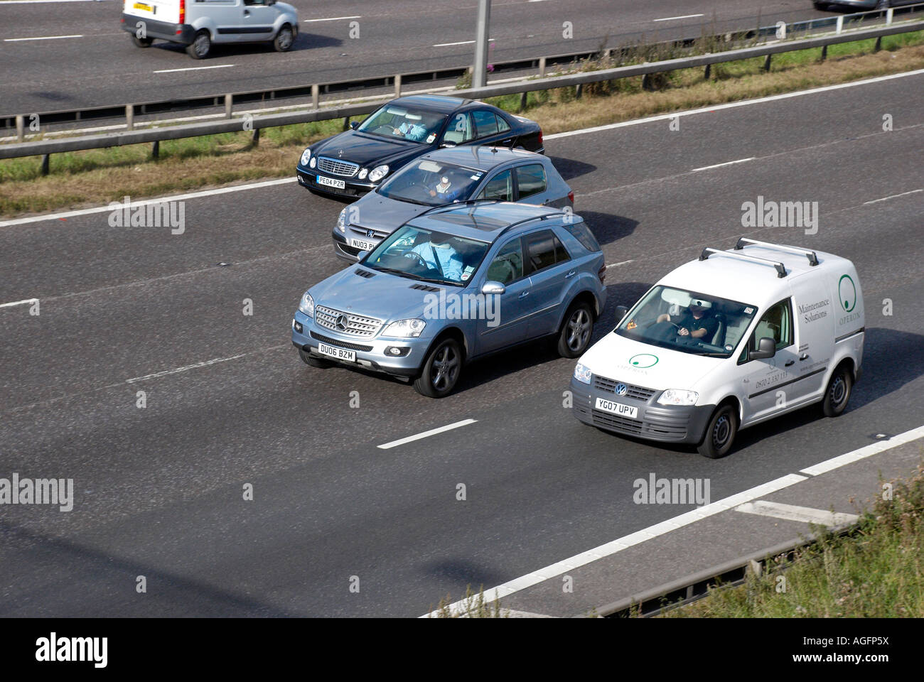 cars in a line on the motorway Stock Photo - Alamy