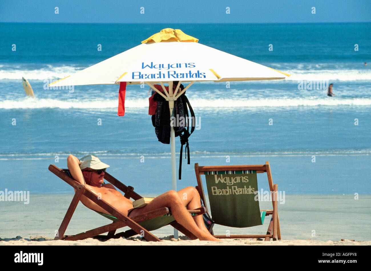 Man with parasol hi-res stock photography and images - Alamy