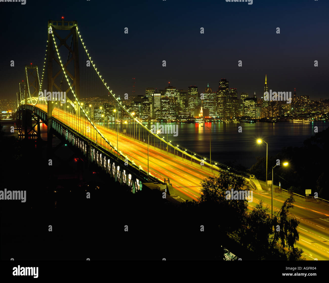 Traffic streaming over the Oakland Bay Bridge across San Francisco Bay ...