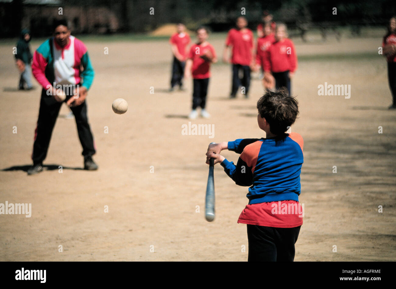 class of school children playing baseball, Central Park, New York, USA ...