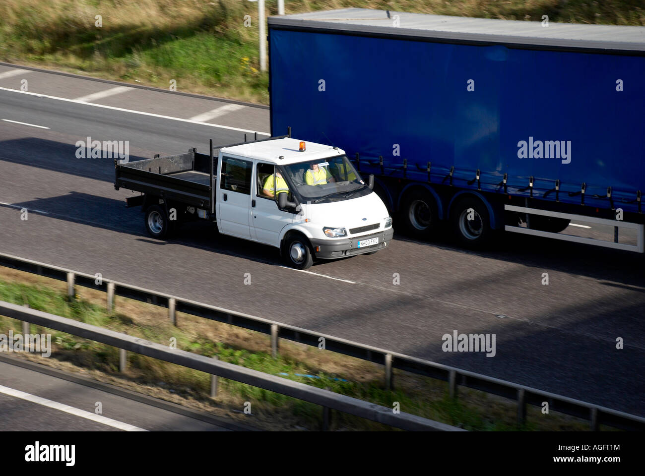 ford transit tipper double cab on motorway (M62 Stock Photo - Alamy