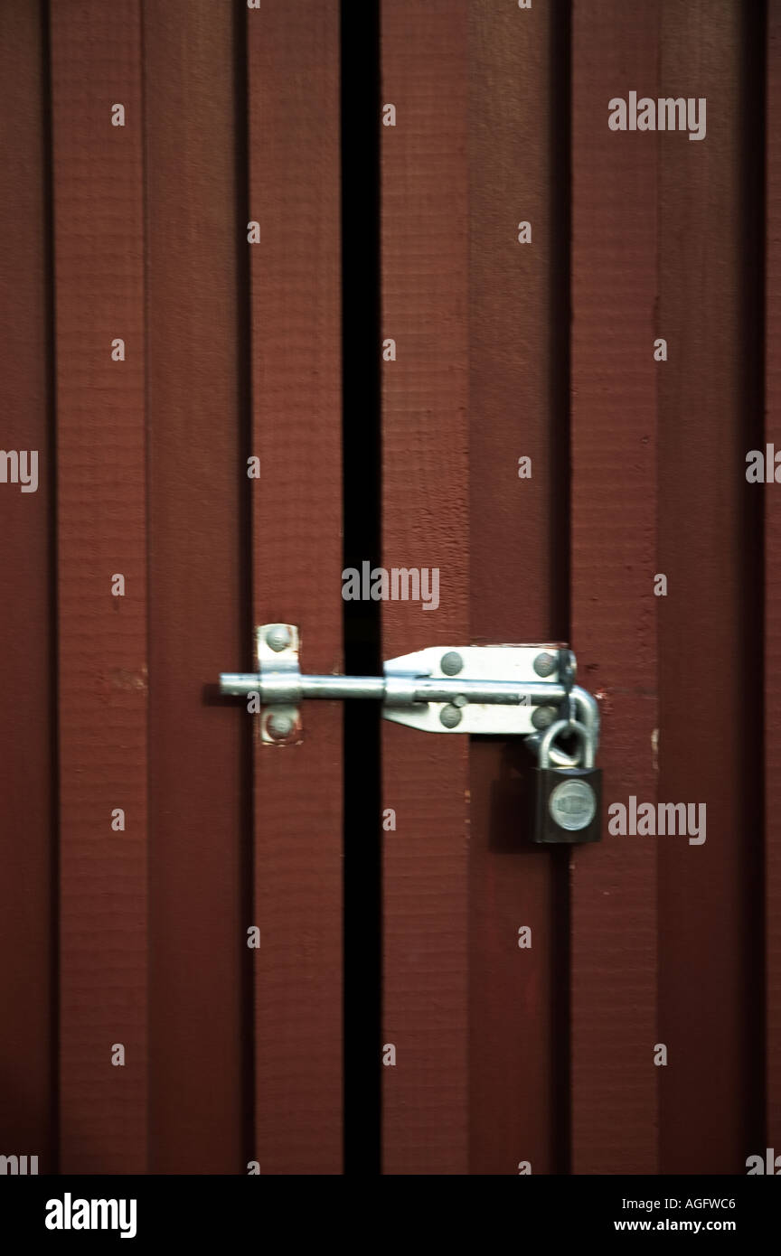 simple security measures bolt and padlock Stock Photo - Alamy