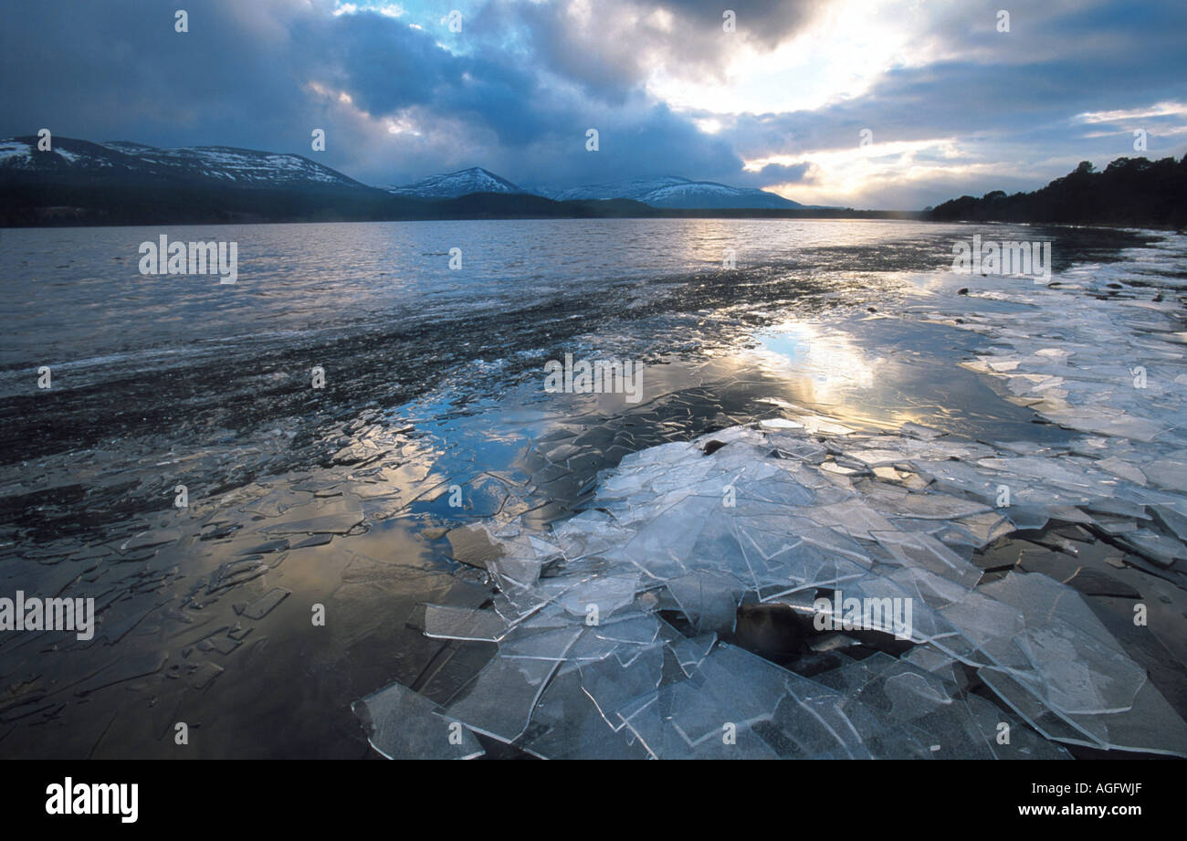 sunset, on stormy winters day over Loch Morlich, Scotland, Highlands ...