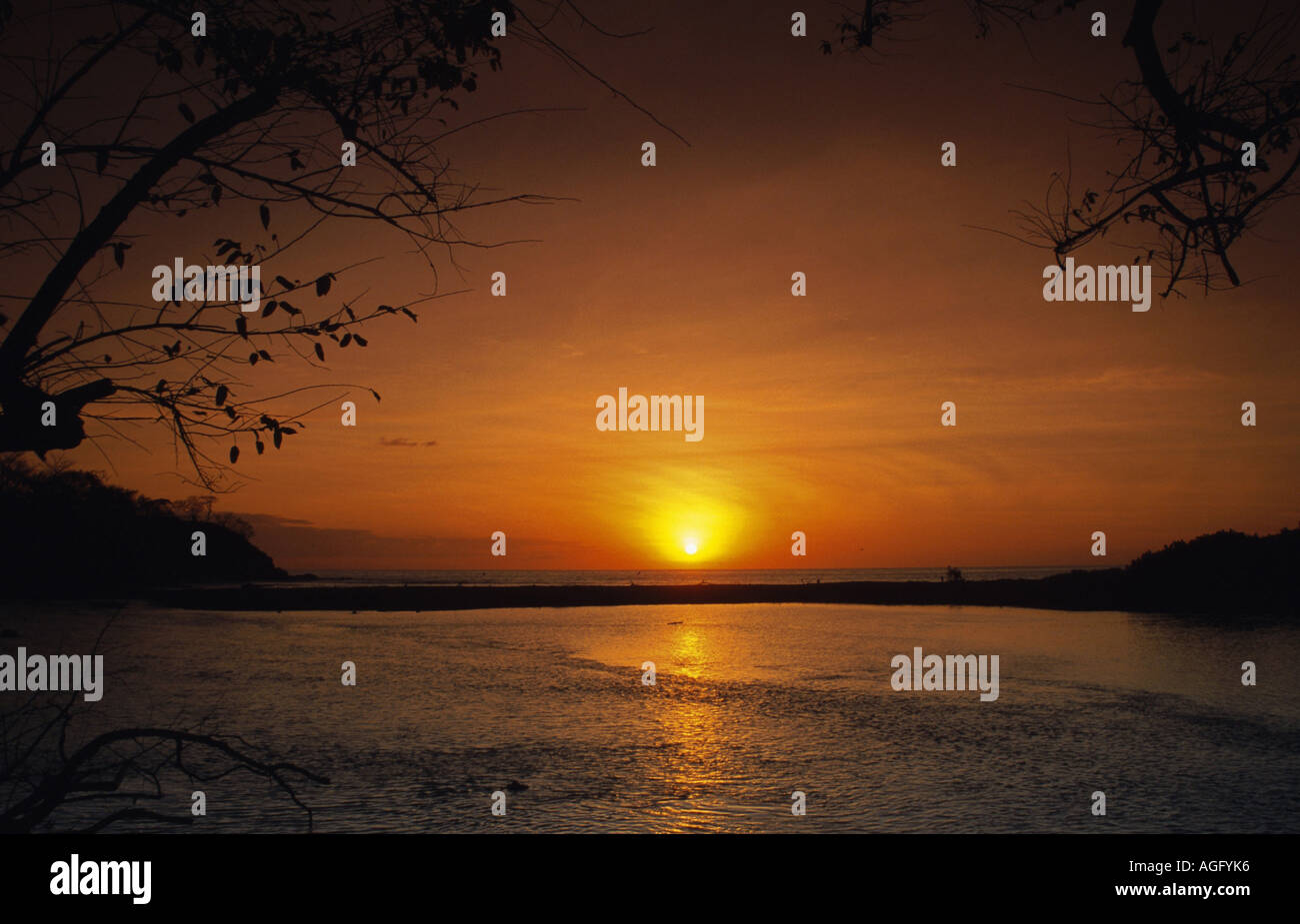 Costa rica w layer sun sunset sunsets hi-res stock photography and ...