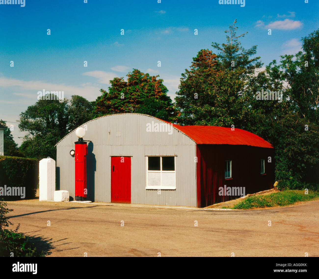 an old vintage petrol service garage gas station with petrol pump in a ...