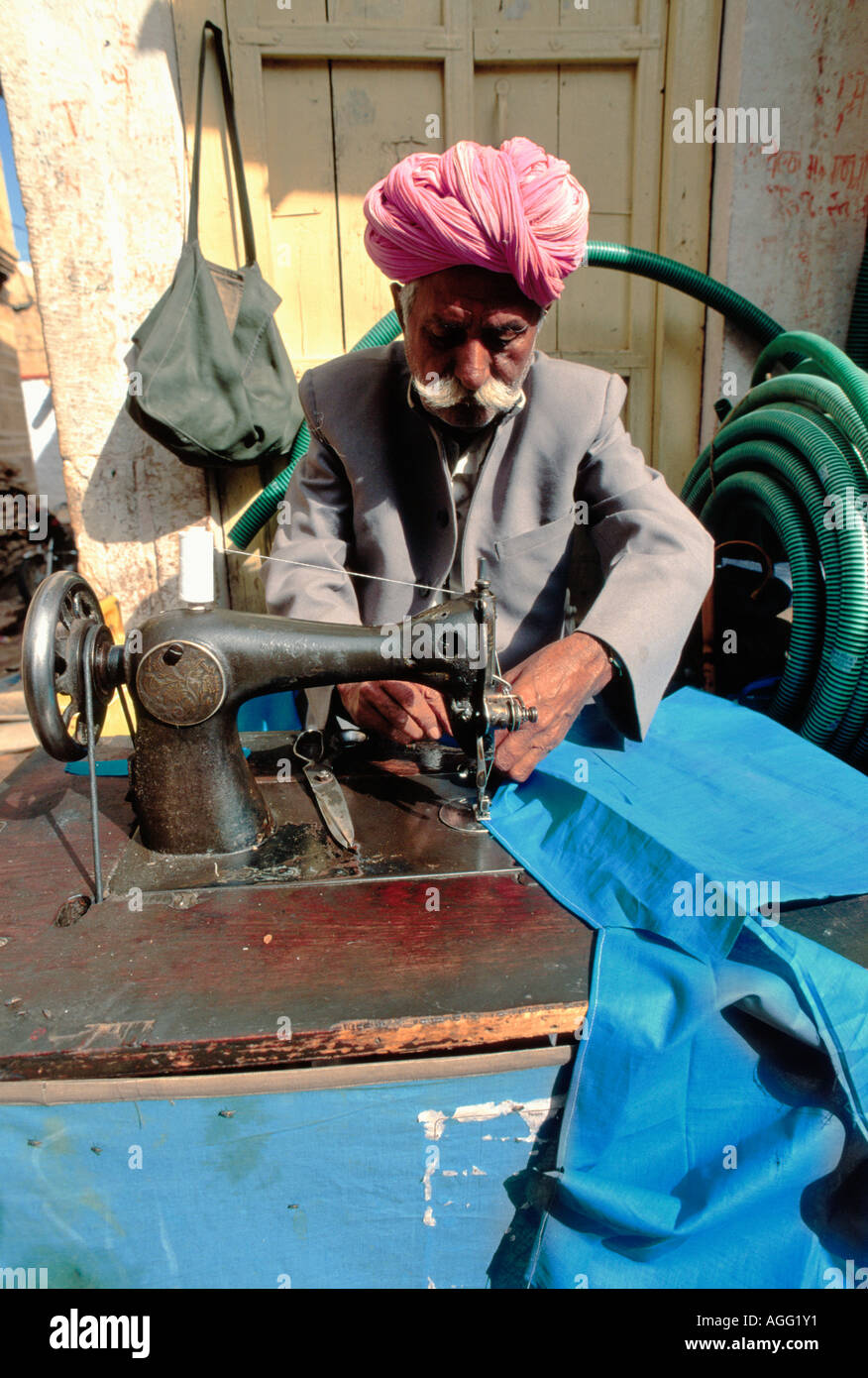 man working with sewing machine, Jaisalmer, Rajasthan, India Stock ...