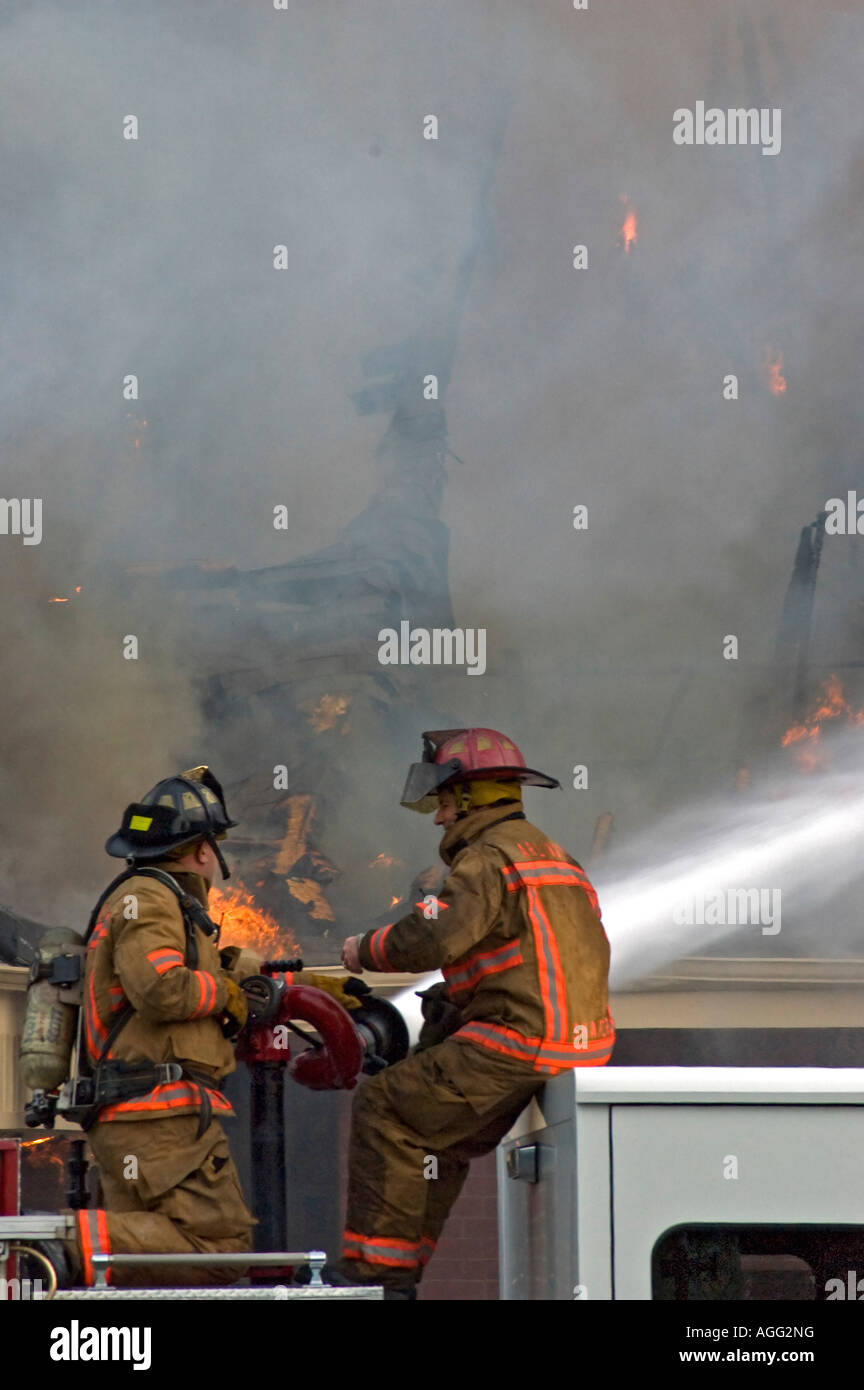 Putting out fire with water hi-res stock photography and images - Alamy