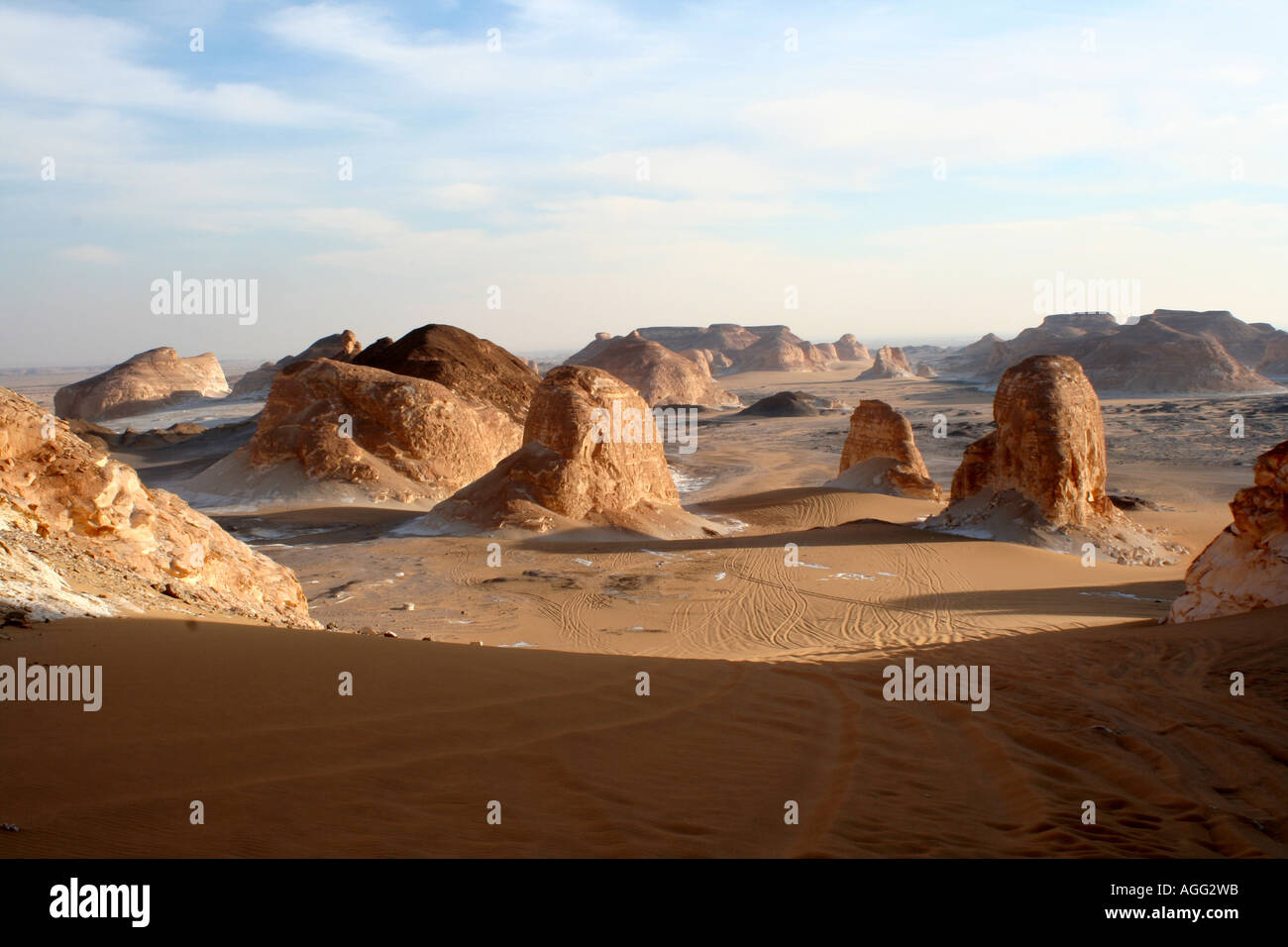 huge limestone rocks casting shadows in the white desert, Egypt, White ...