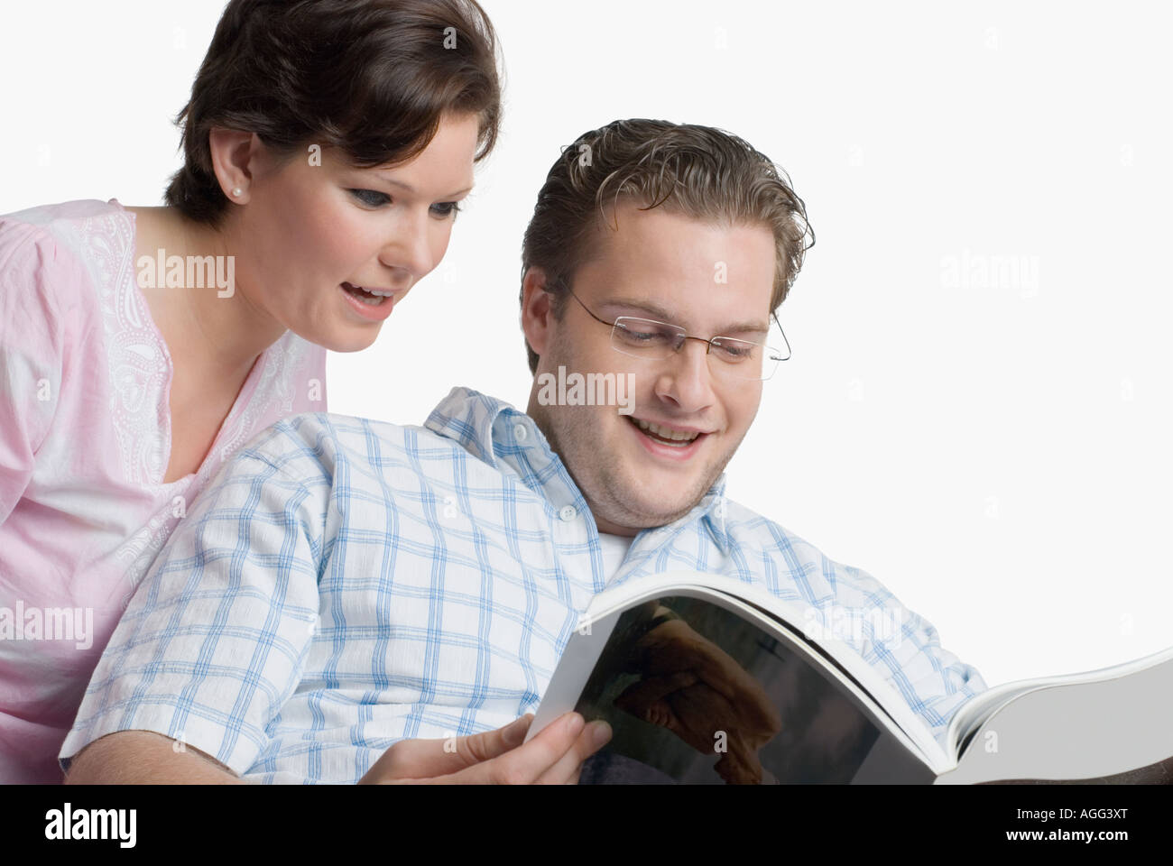 Reading a magazine standing hi-res stock photography and images - Alamy
