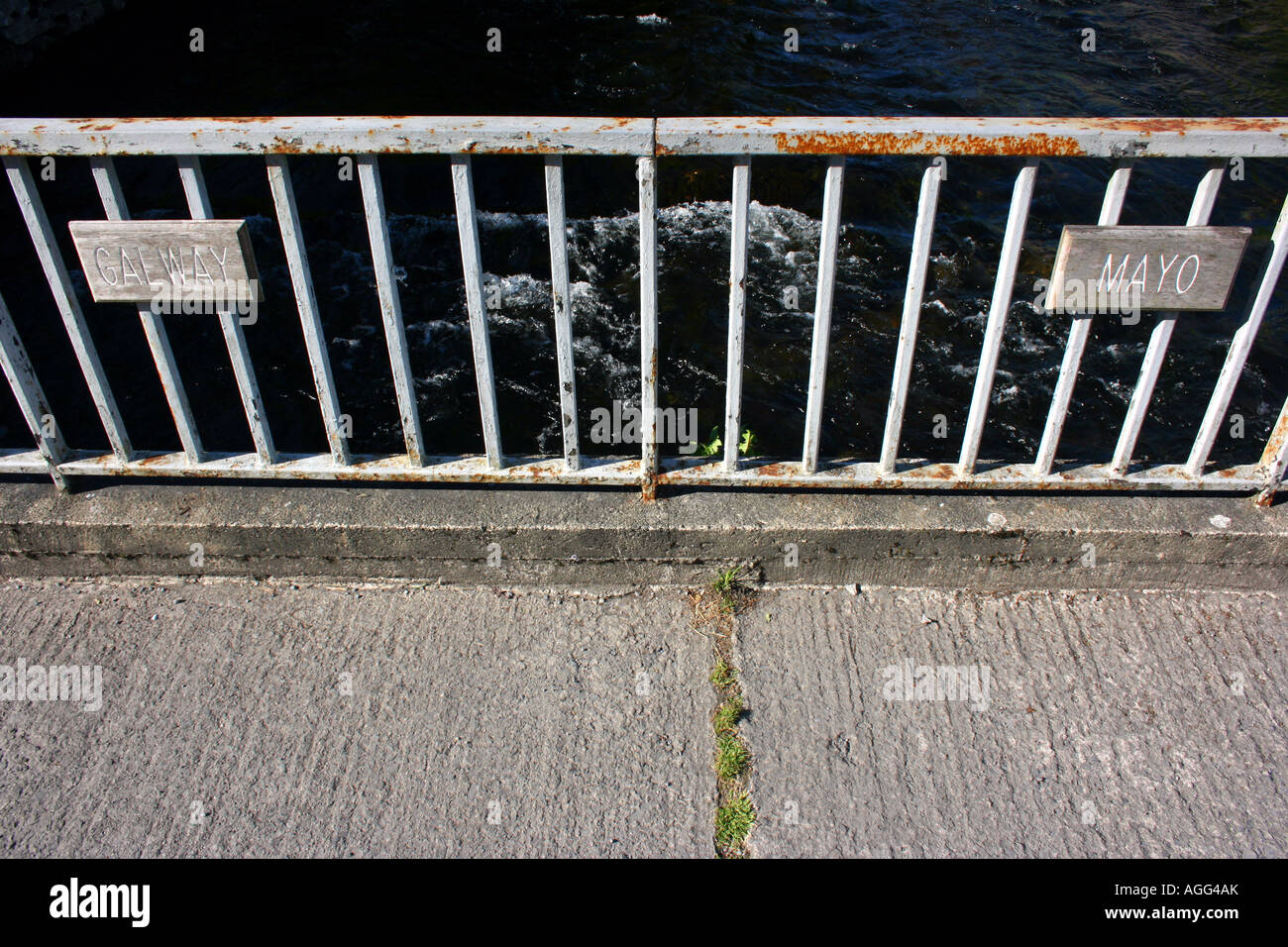 Bridge over the Cong River river in Cong, Ireland, spanning both County ...