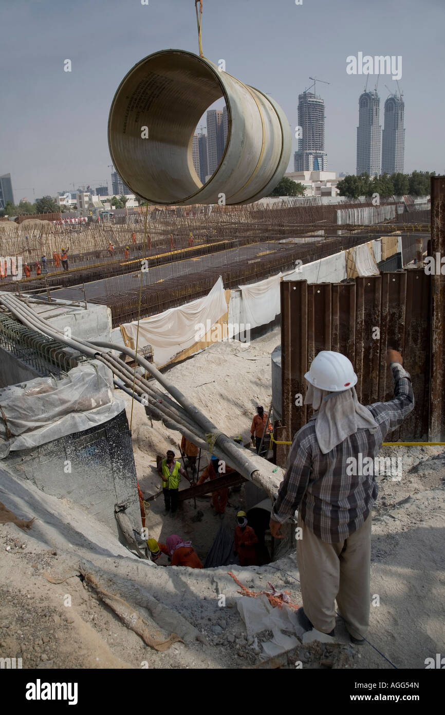 New road and drainage construction site showing reinforced concrete ...