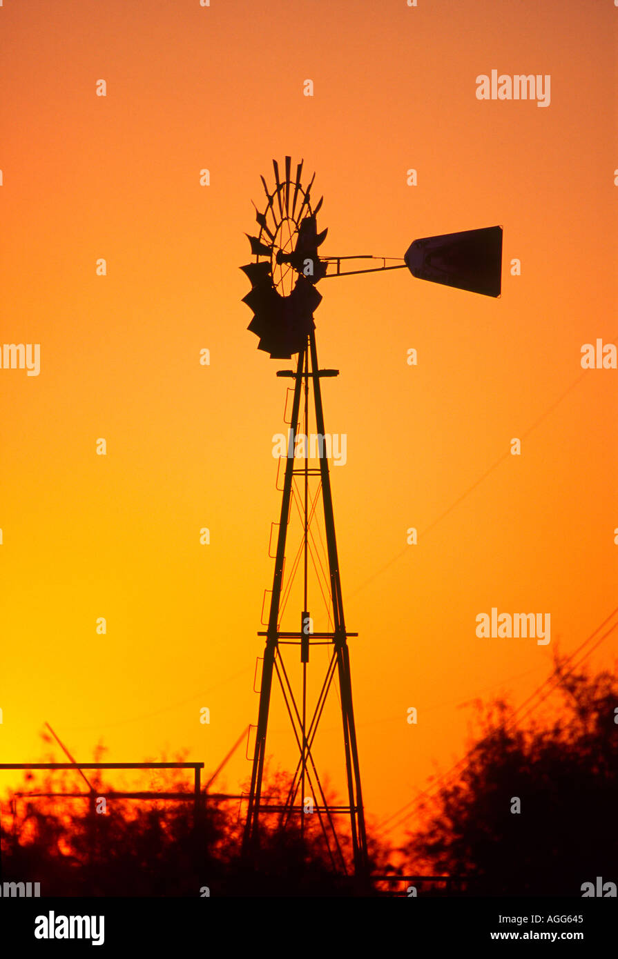 silhouetted windmill at sunset near Palo Duro Canyon State Park Texas ...