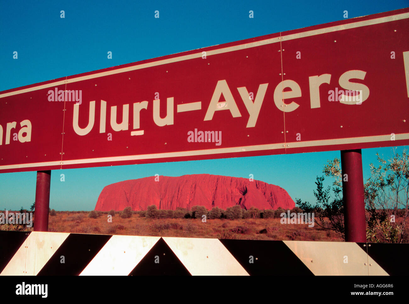 road sign and Ayers Rock, Northern Territory, Australia Stock Photo - Alamy