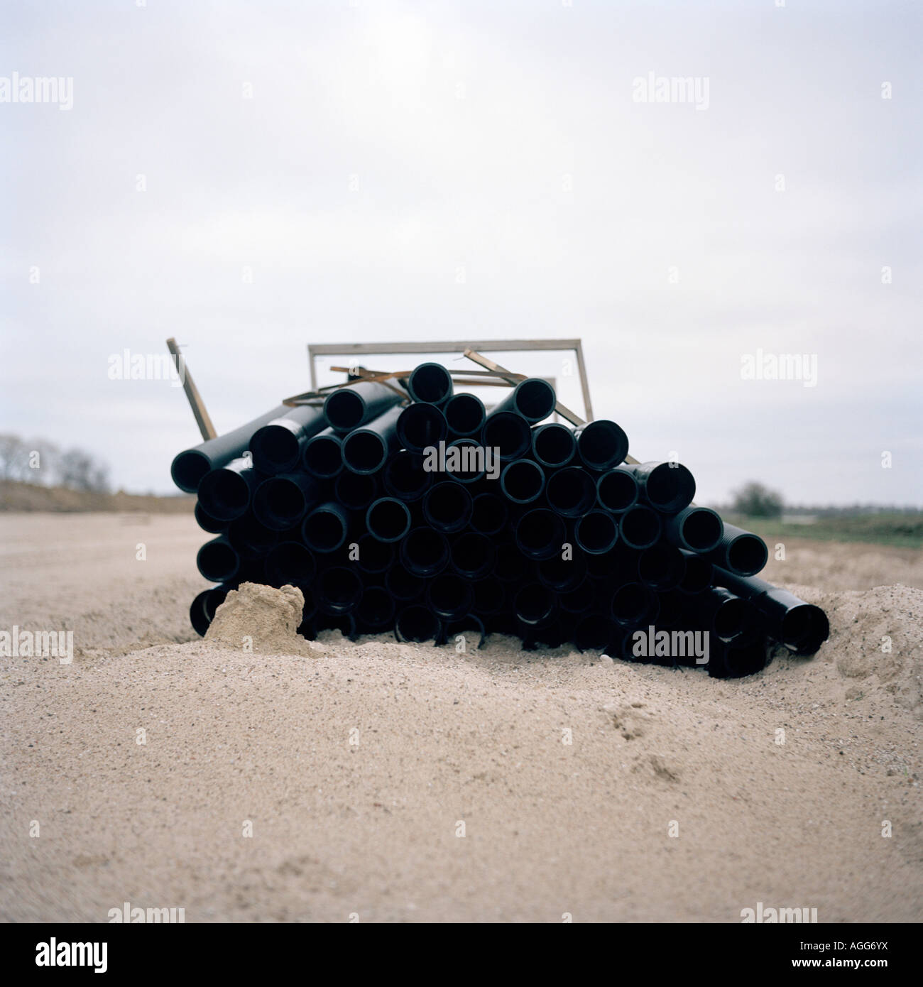 Black tubes used for construction Stock Photo - Alamy