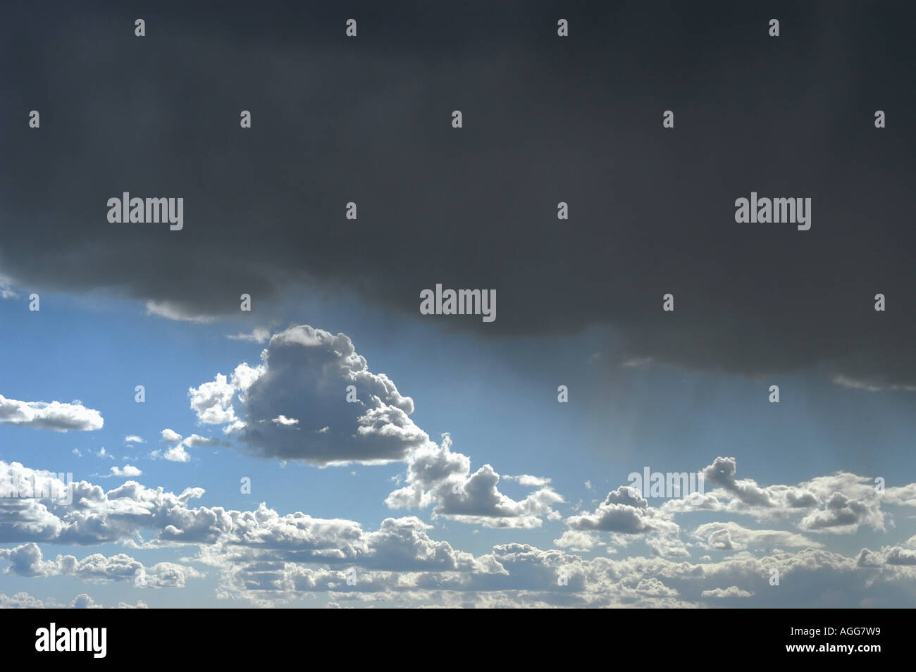 Thundercloud rain over blue hi-res stock photography and images - Alamy
