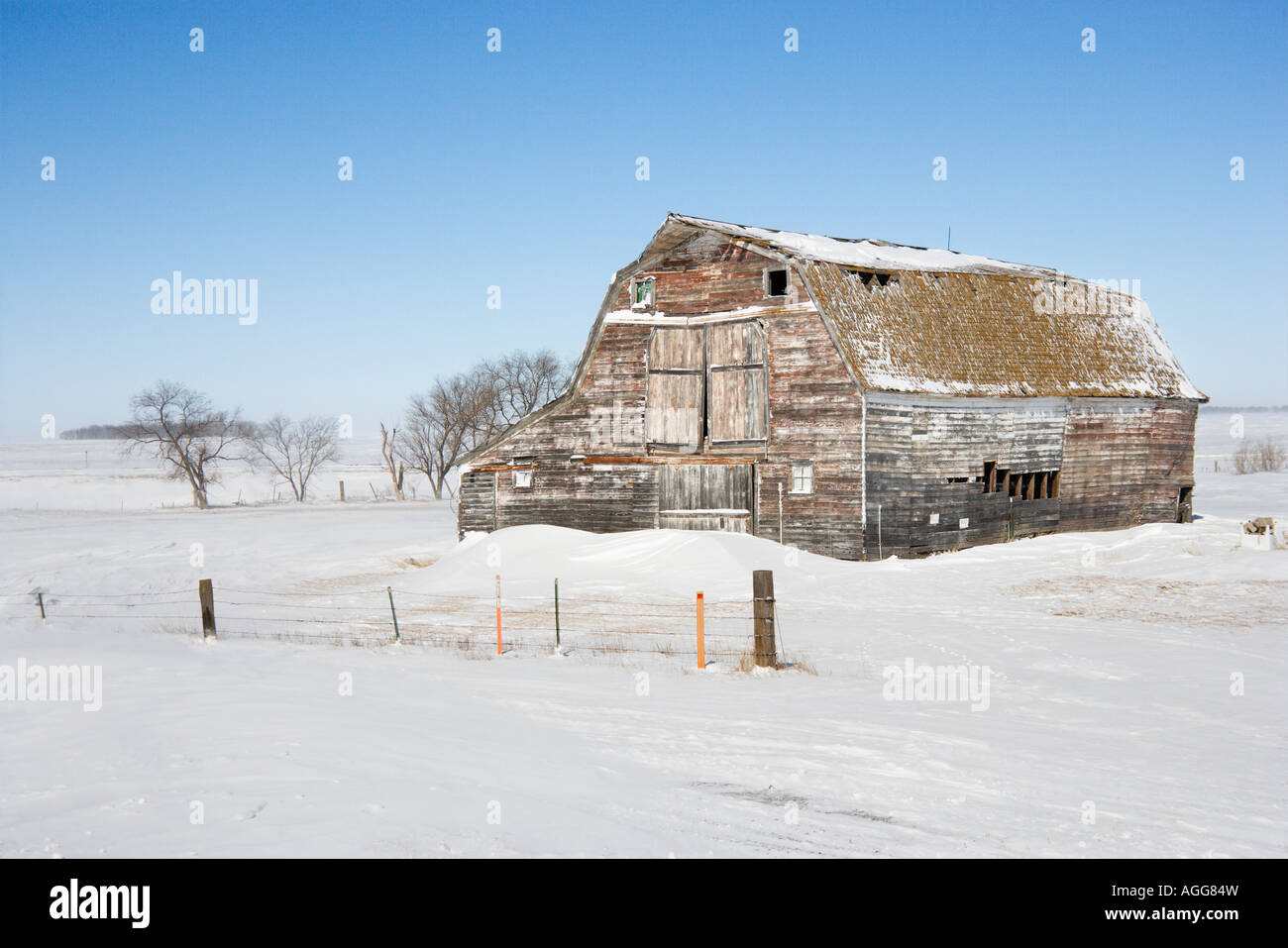 Rustic barn in rural snow covered landscape Stock Photo - Alamy