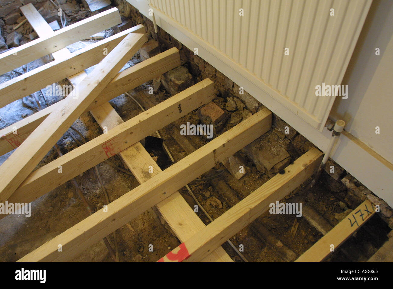 House repairs and new floor boards after finding damp and dry rot Stock ...