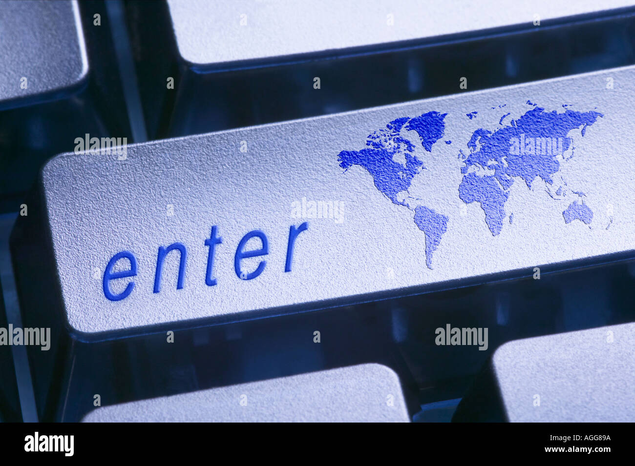 World map on enter key Stock Photo - Alamy