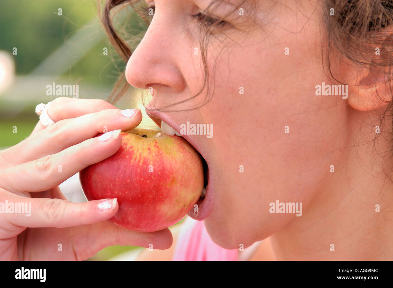 Taking a big bite hi-res stock photography and images - Alamy