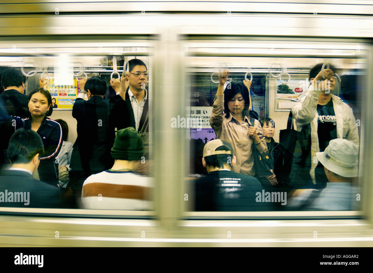 commuters on subway train, Tokyo, Japan Stock Photo - Alamy