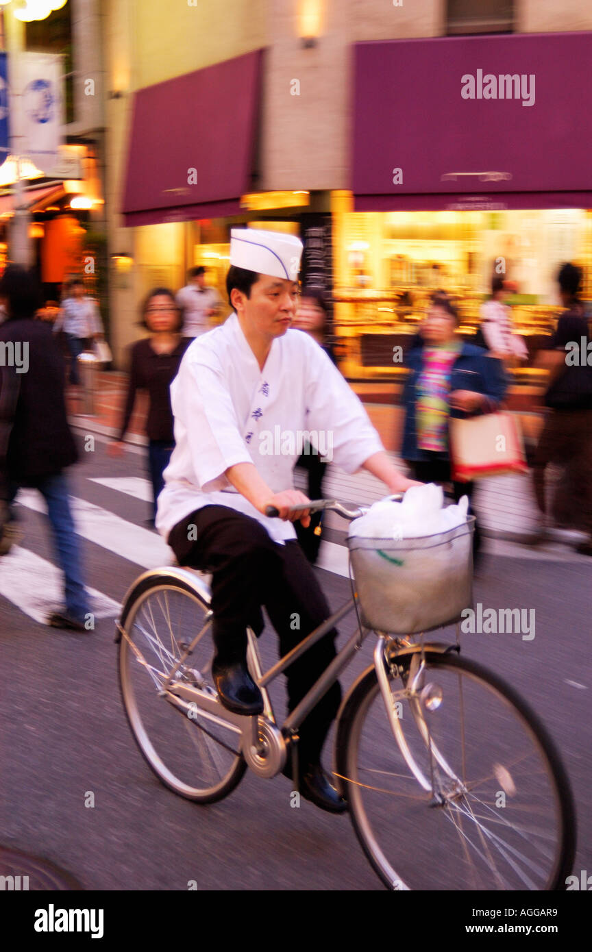 chef on bicycle, Tokyo, Japan Stock Photo - Alamy