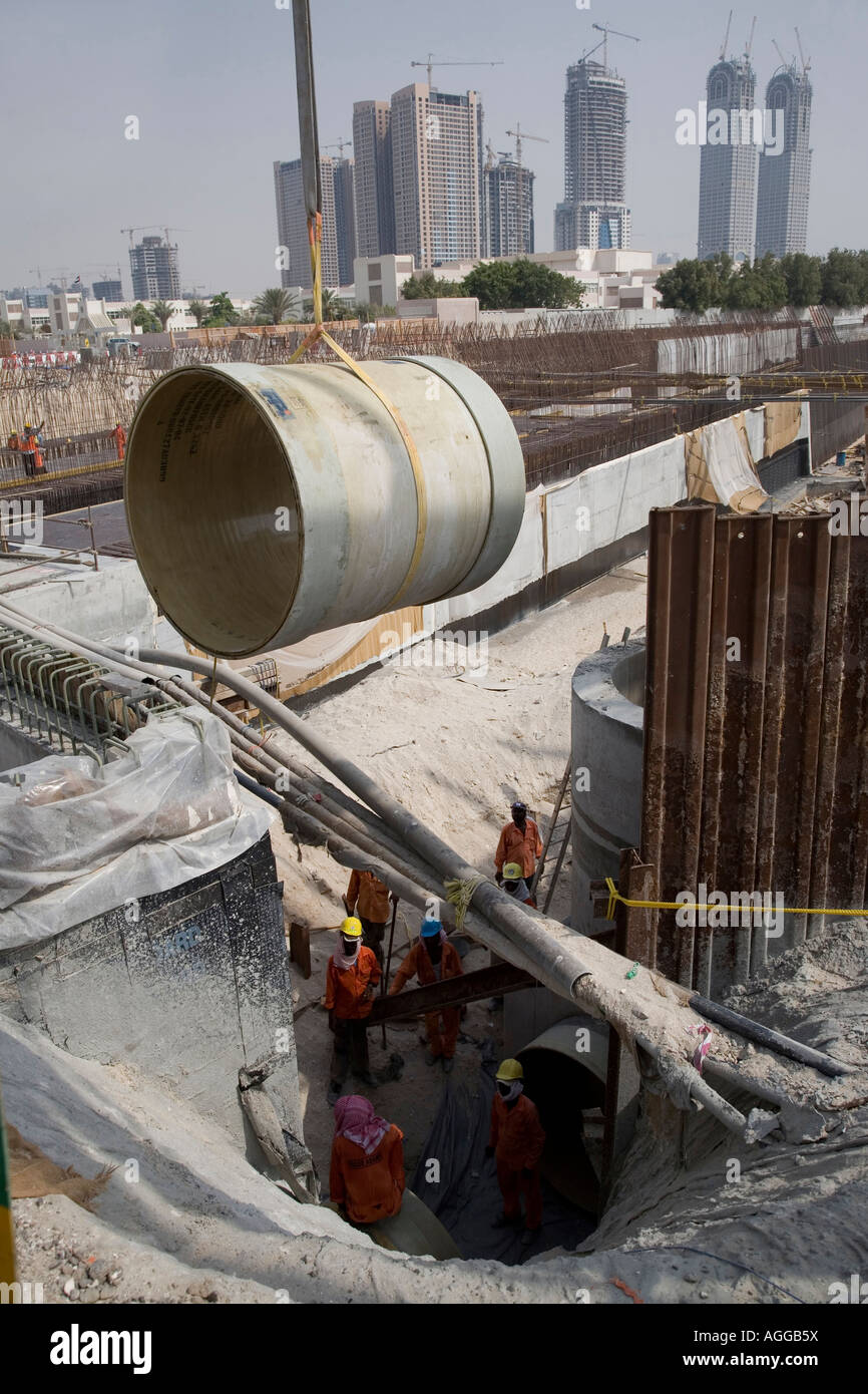 New road and drainage construction site showing reinforced concrete ...