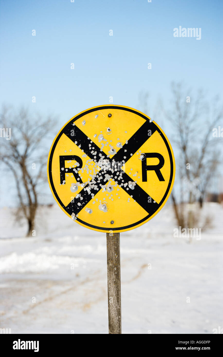 Railroad crossing sign in snow covered rural landscape Stock Photo - Alamy