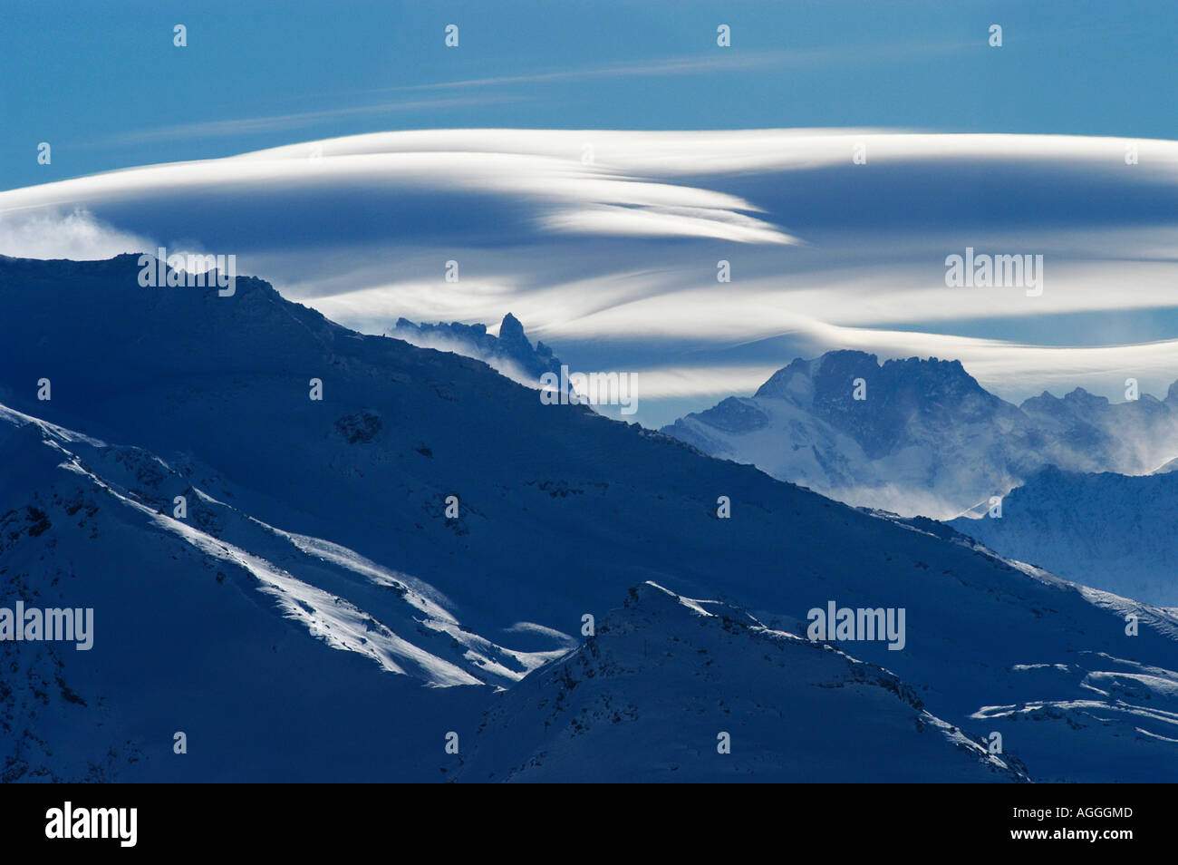 surreal cloud formation above mountain chain, Val Thorens, French Alps ...