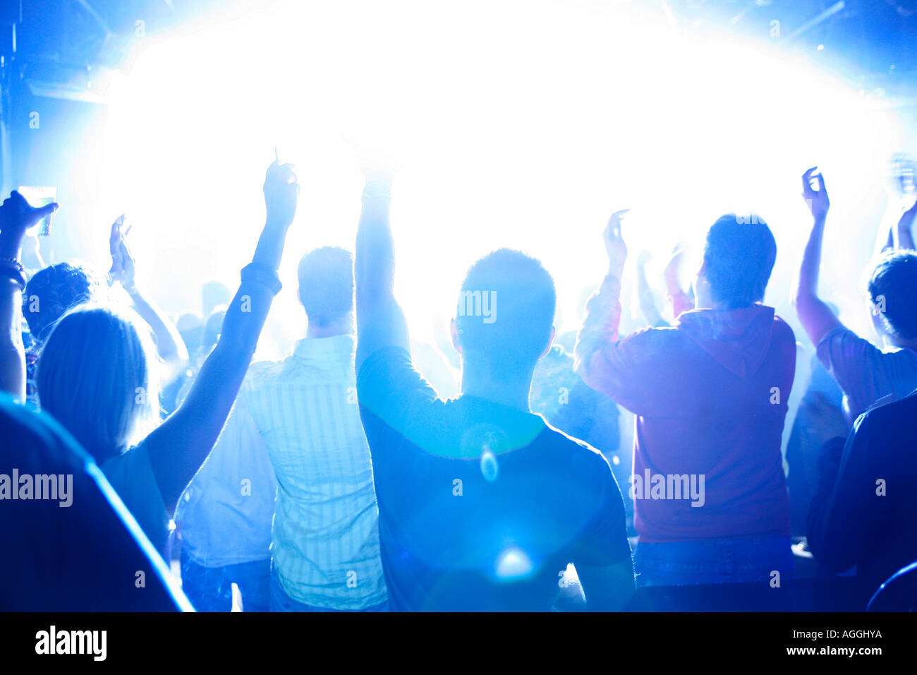 Clubbers clapping and cheering on the dancefloor Stock Photo - Alamy