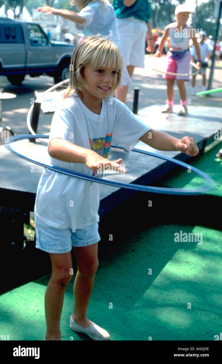 Hula hooping children hi-res stock photography and images - Alamy