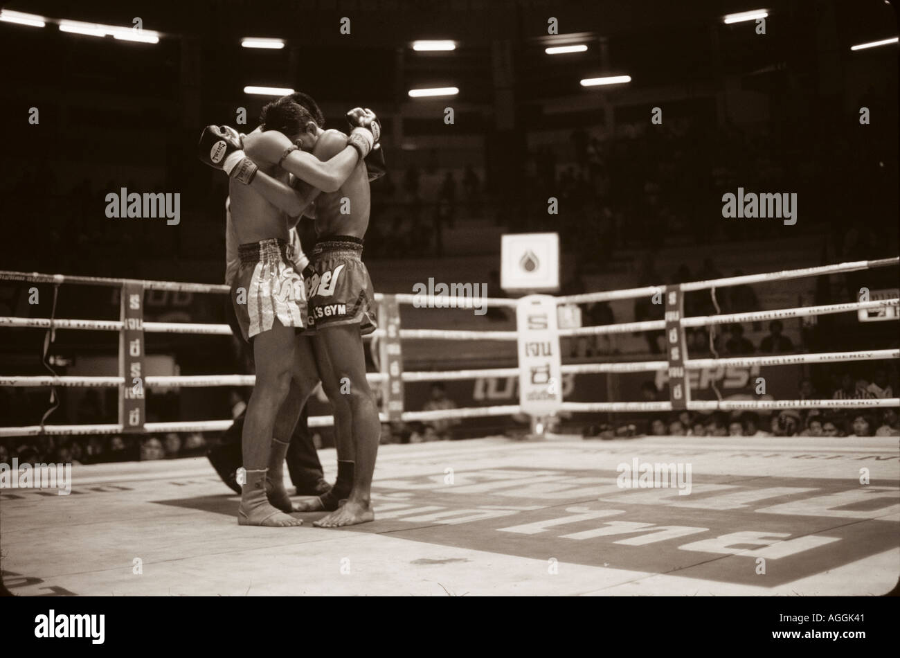 Asia Thailand Bangkok Thai Kick Boxers clench during Muay Thai match at ...