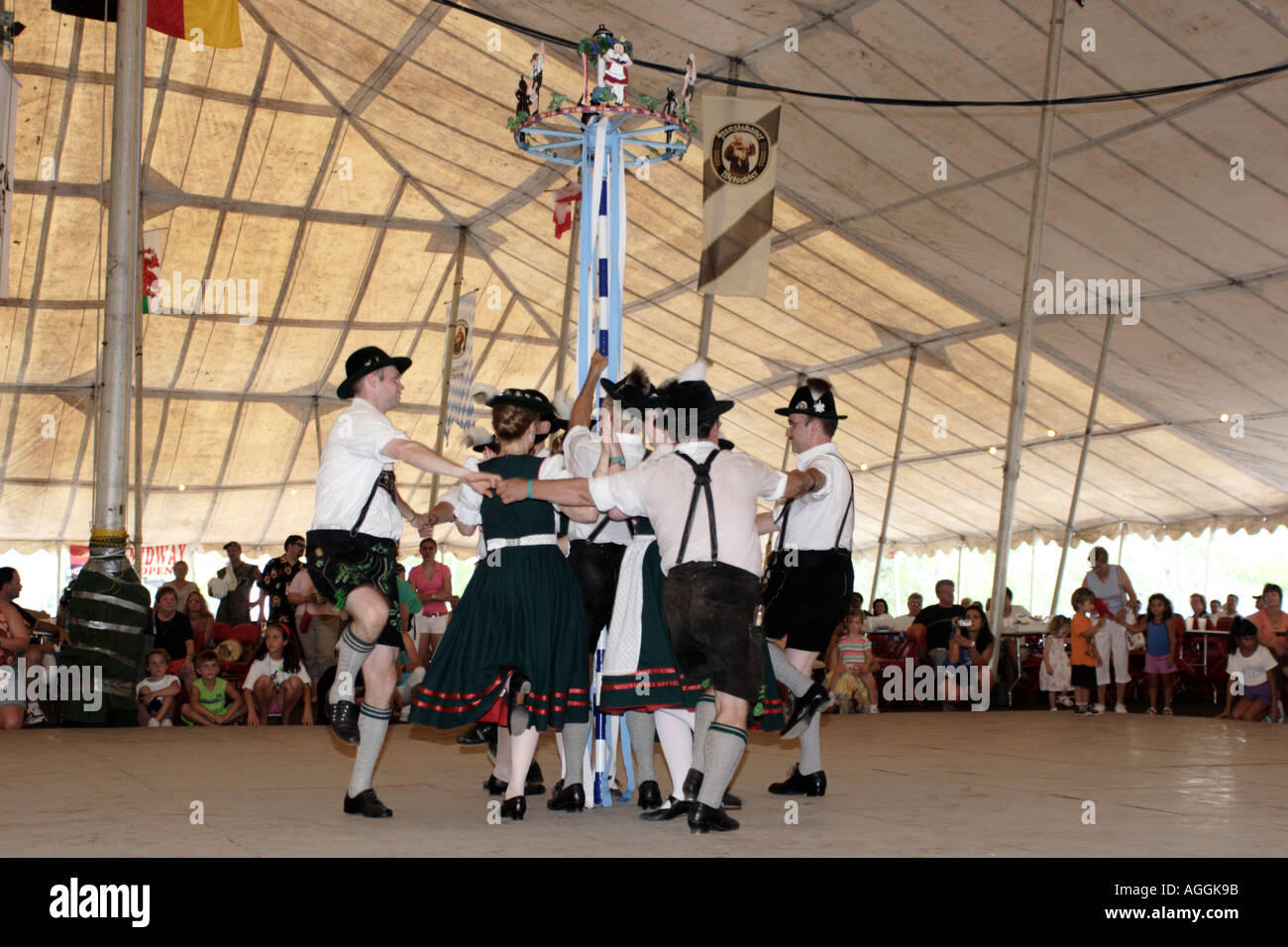 Dancing around the may pole Stock Photo - Alamy