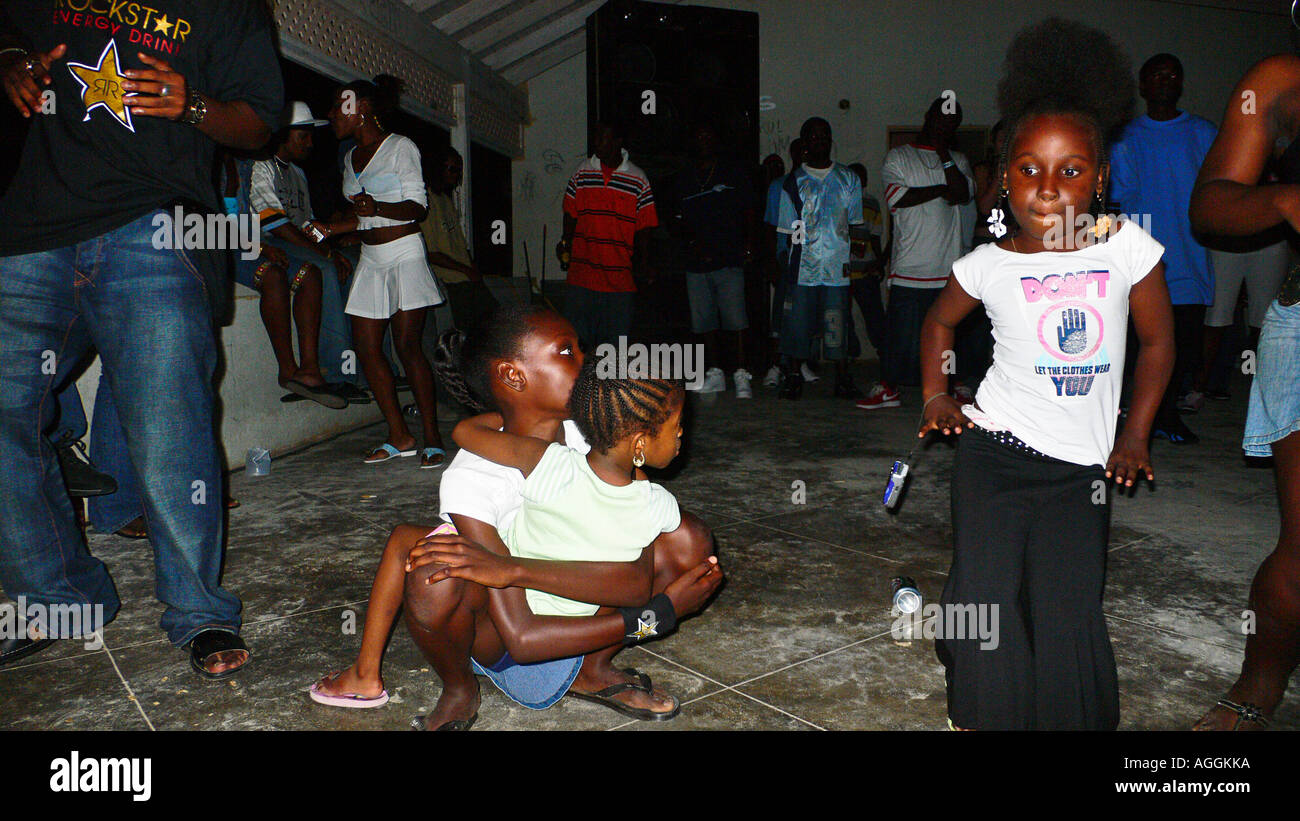 Children dancing at Bikini Sundays Antigua Stock Photo - Alamy