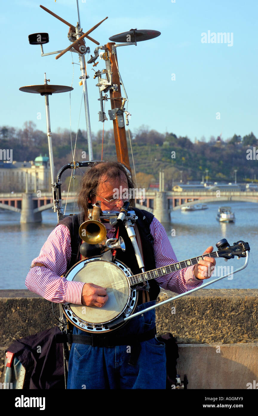 musician playing different instrument simultaneously, Old Town, Prague ...