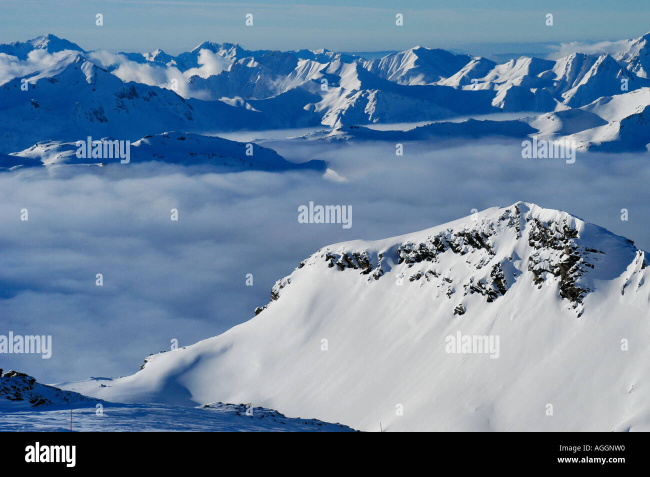 mountain chain above cloud cover, Val Thorens, French Alps, France ...