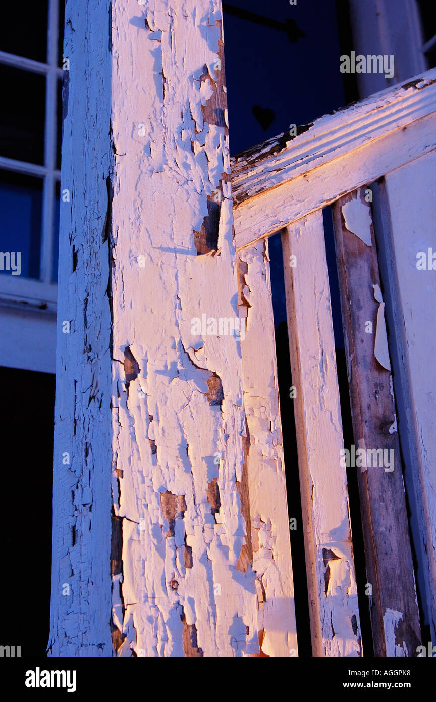old white paint peeling off stair rail, Sweden Stock Photo - Alamy