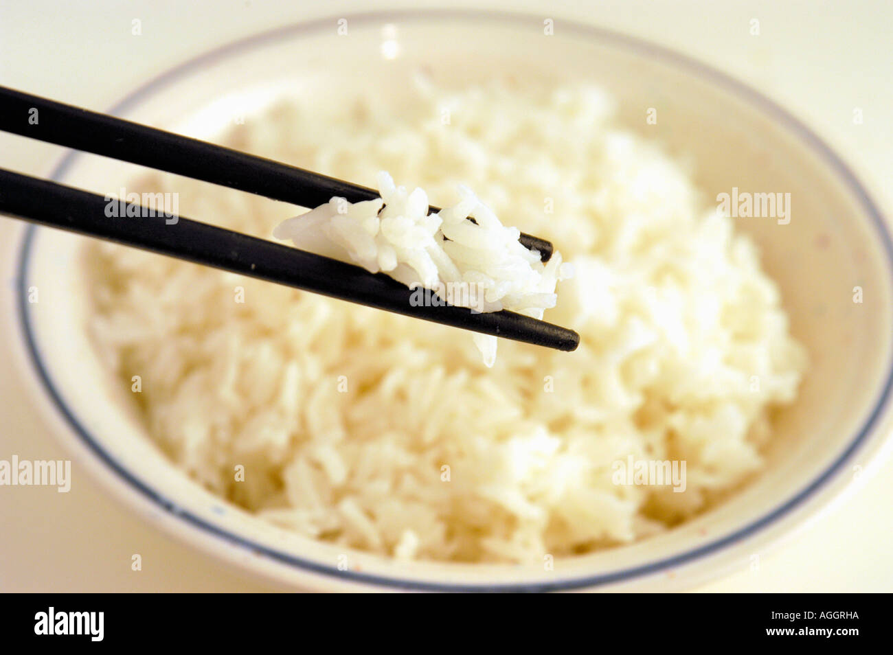 rice with chopsticks Stock Photo - Alamy