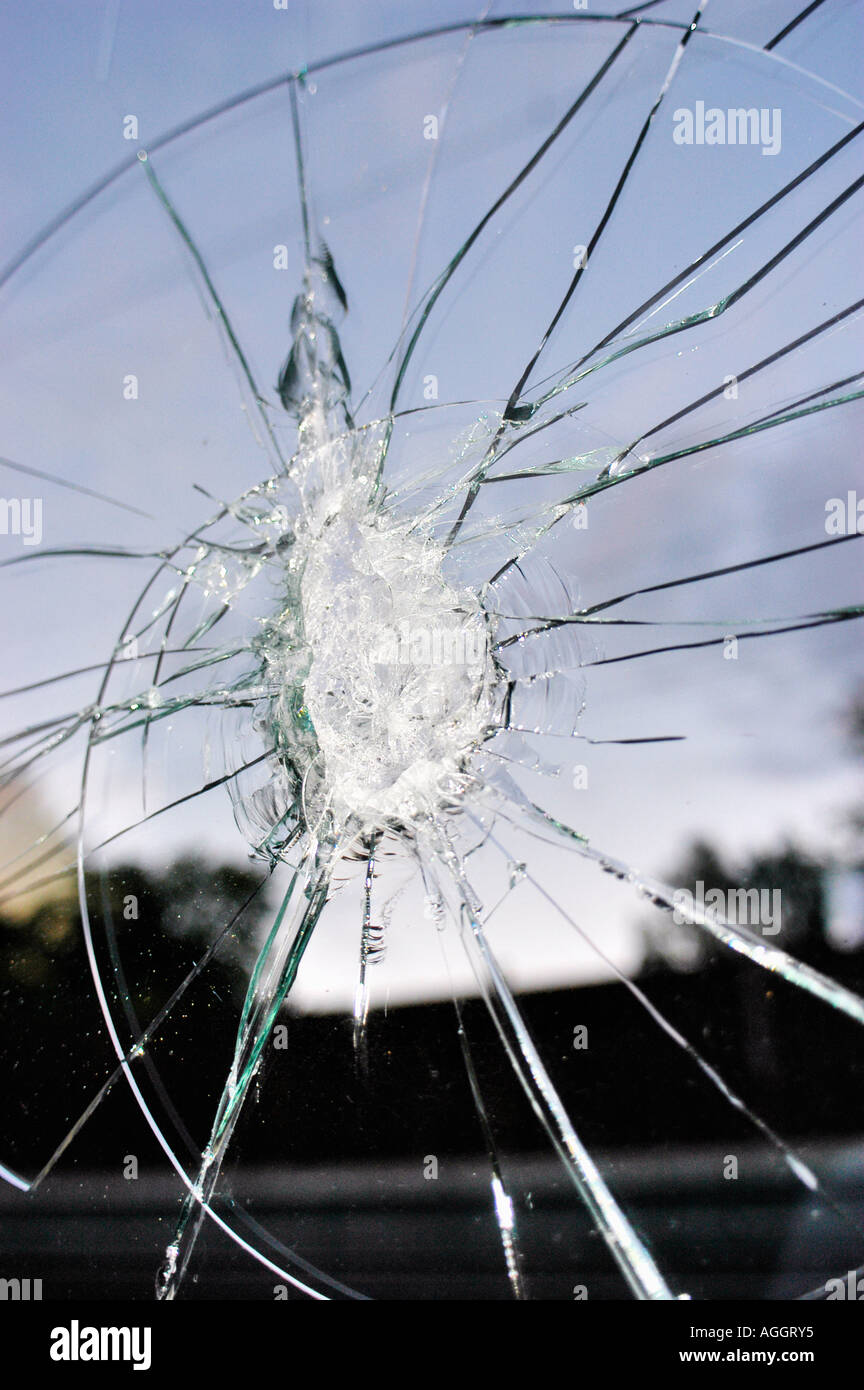 cracked glass shield Stock Photo - Alamy
