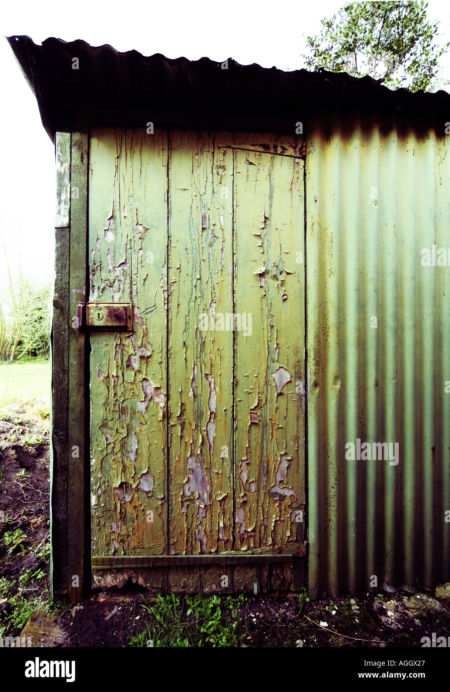 An old shed with flaking paint Stock Photo - Alamy