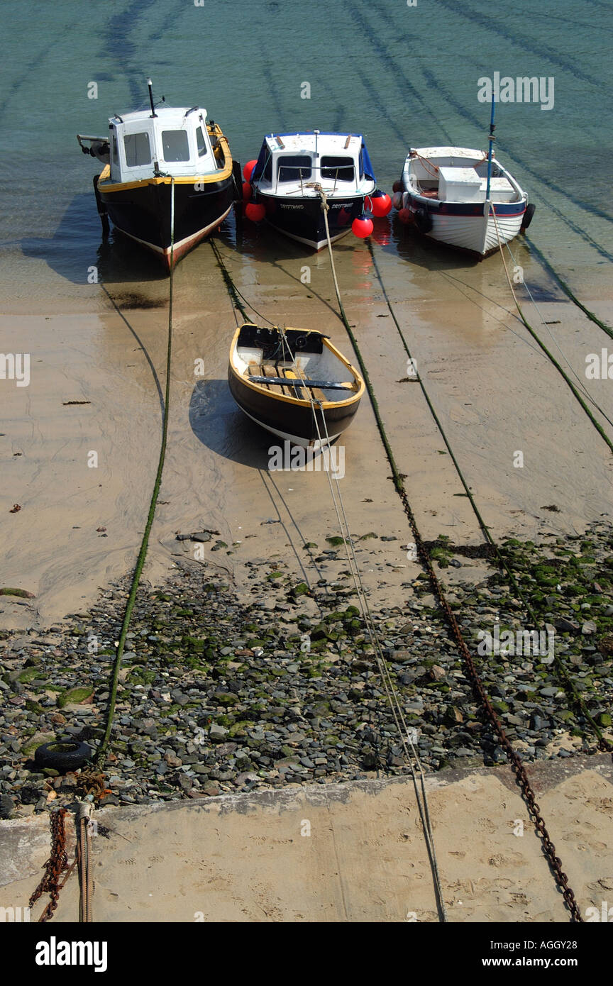 Moored boats in Mousehole harbour Cornwall United Kingdom Stock Photo ...