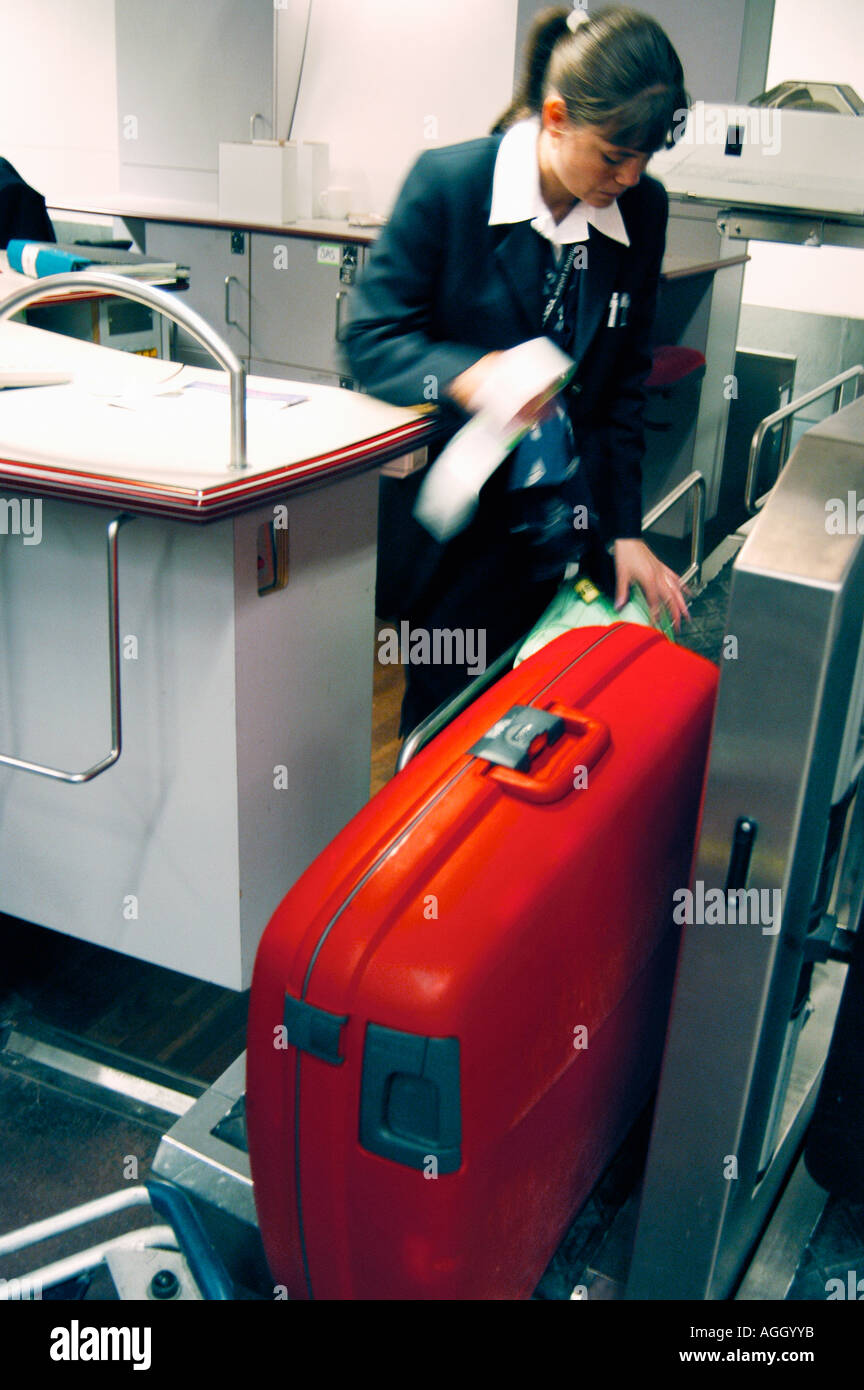 Check-in desk at airport Stock Photo - Alamy