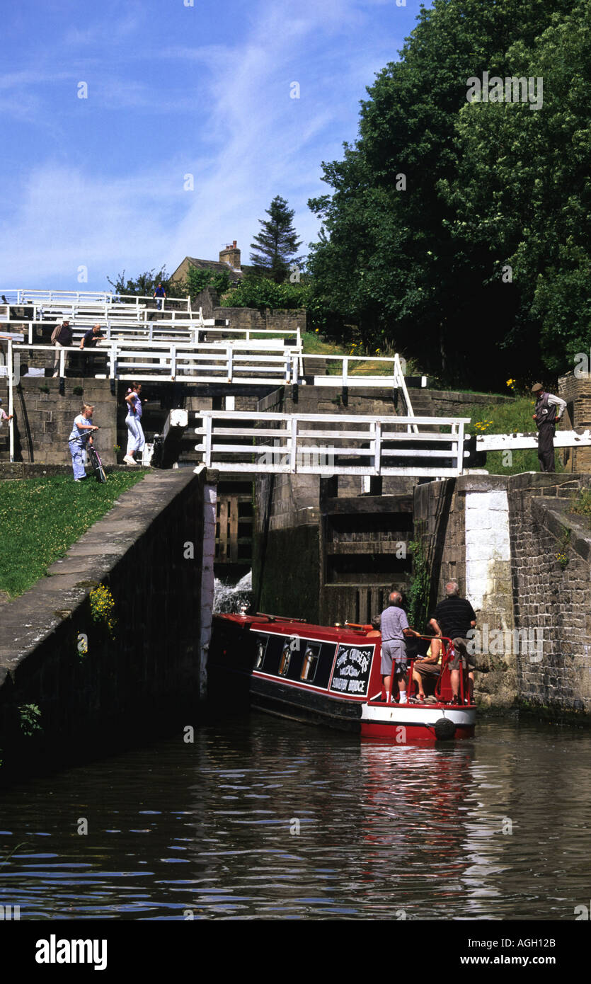 canal barge entering Bingley five rise locks on the Leeds Liverpool ...
