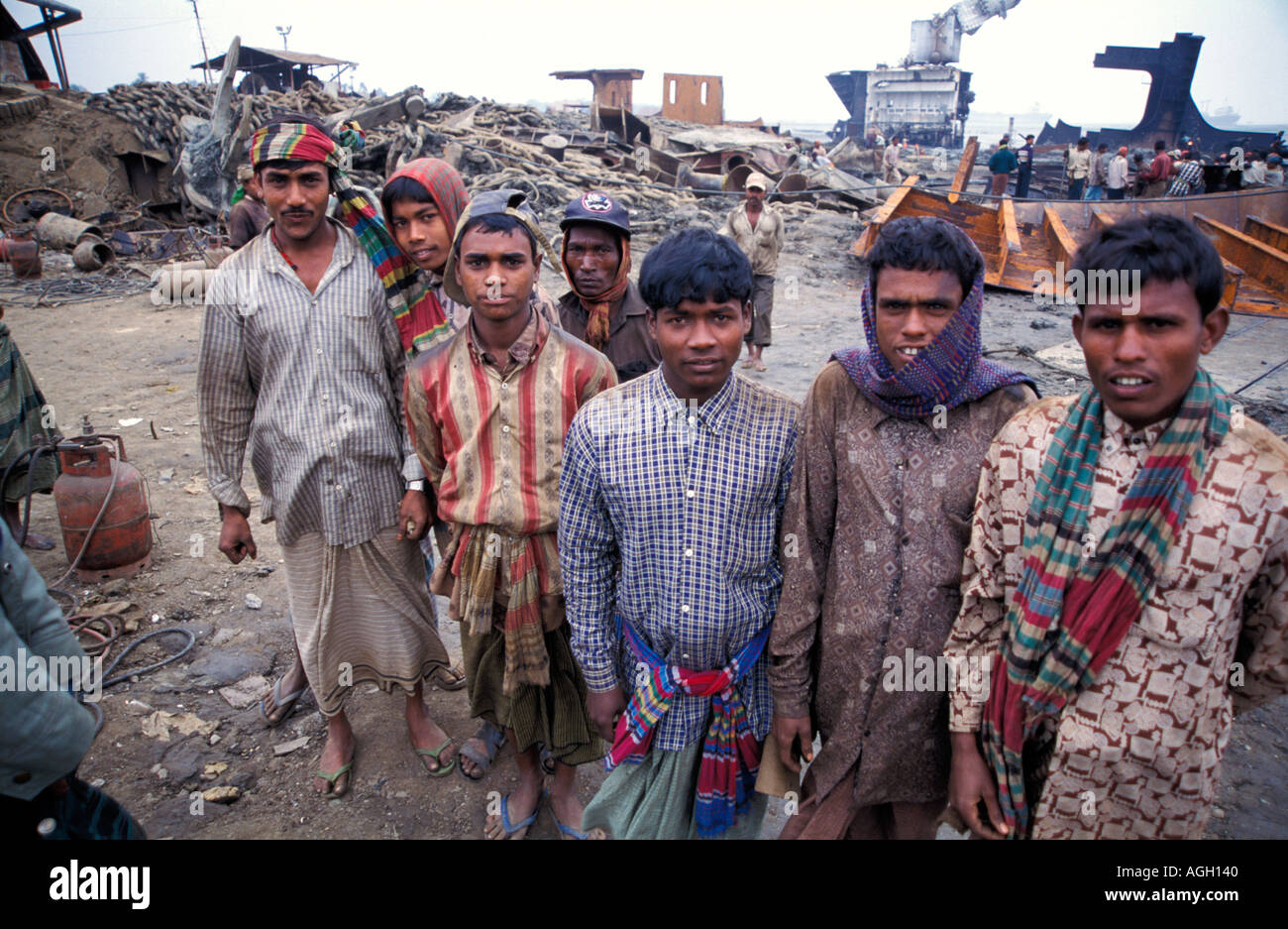 Bangladesh ship breaking yard (Chittagong). Ship recycling yard with industrial workers, heavy ...