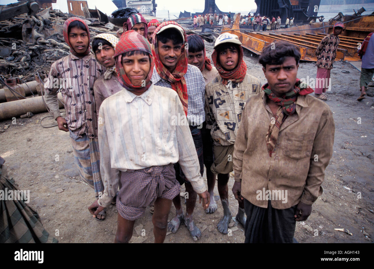 Bangladesh ship breaking yard (Chittagong). Ship recycling yard with industrial workers, heavy ...