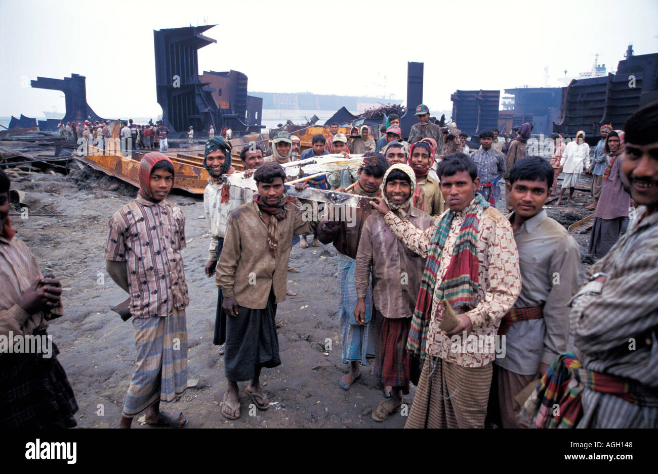 Bangladesh ship breaking yard (Chittagong). Ship recycling yard with industrial workers, heavy ...