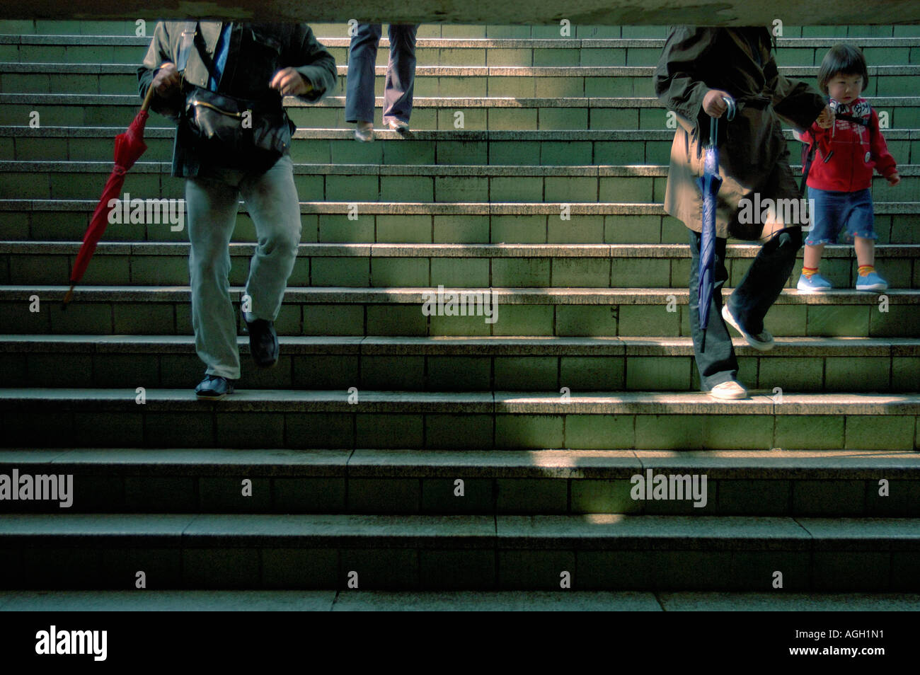 pedestrians descending stairs to subway, Ginza, Tokyo, Japan Stock ...