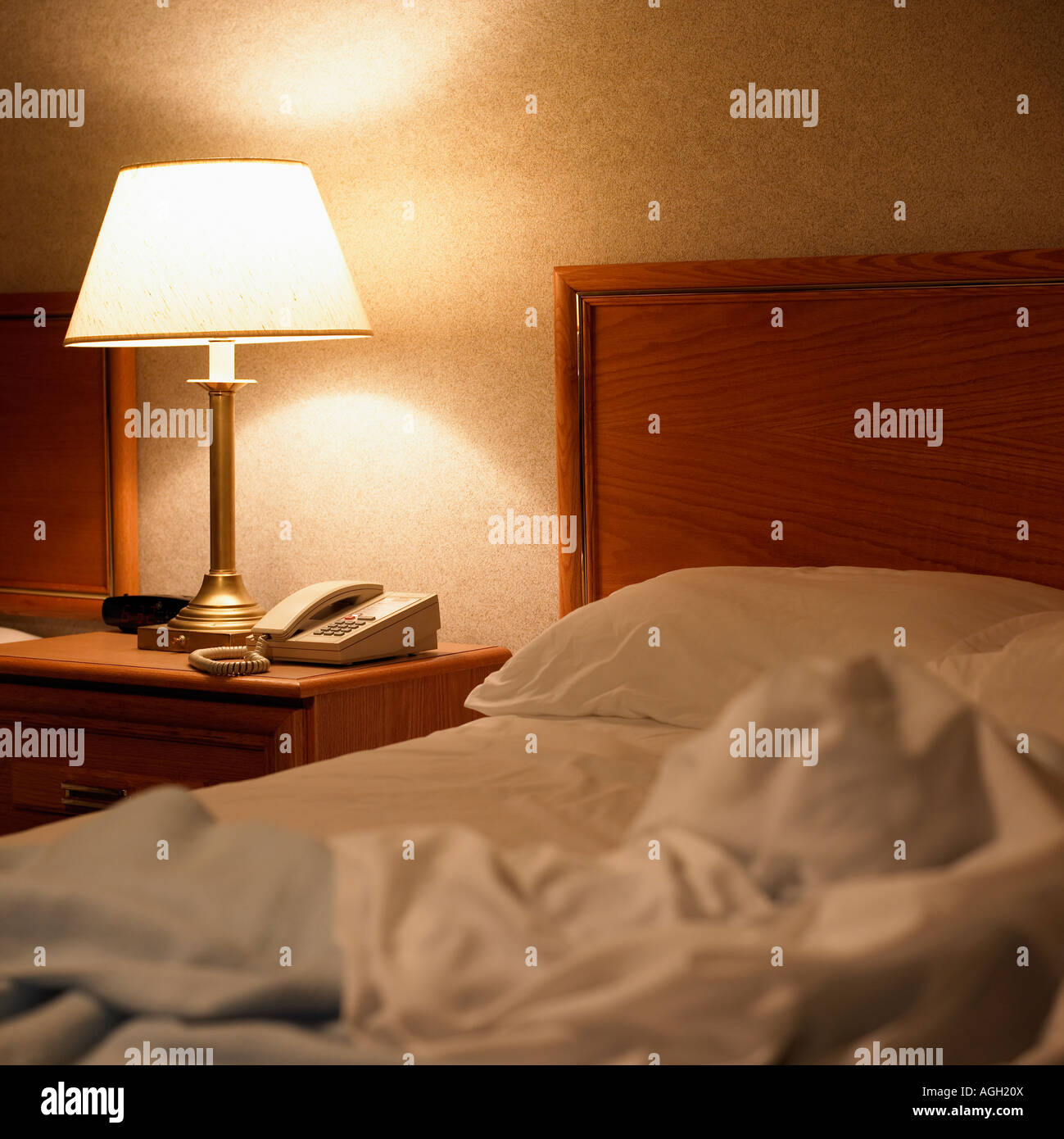 Empty bed in hotel motel room Stock Photo - Alamy