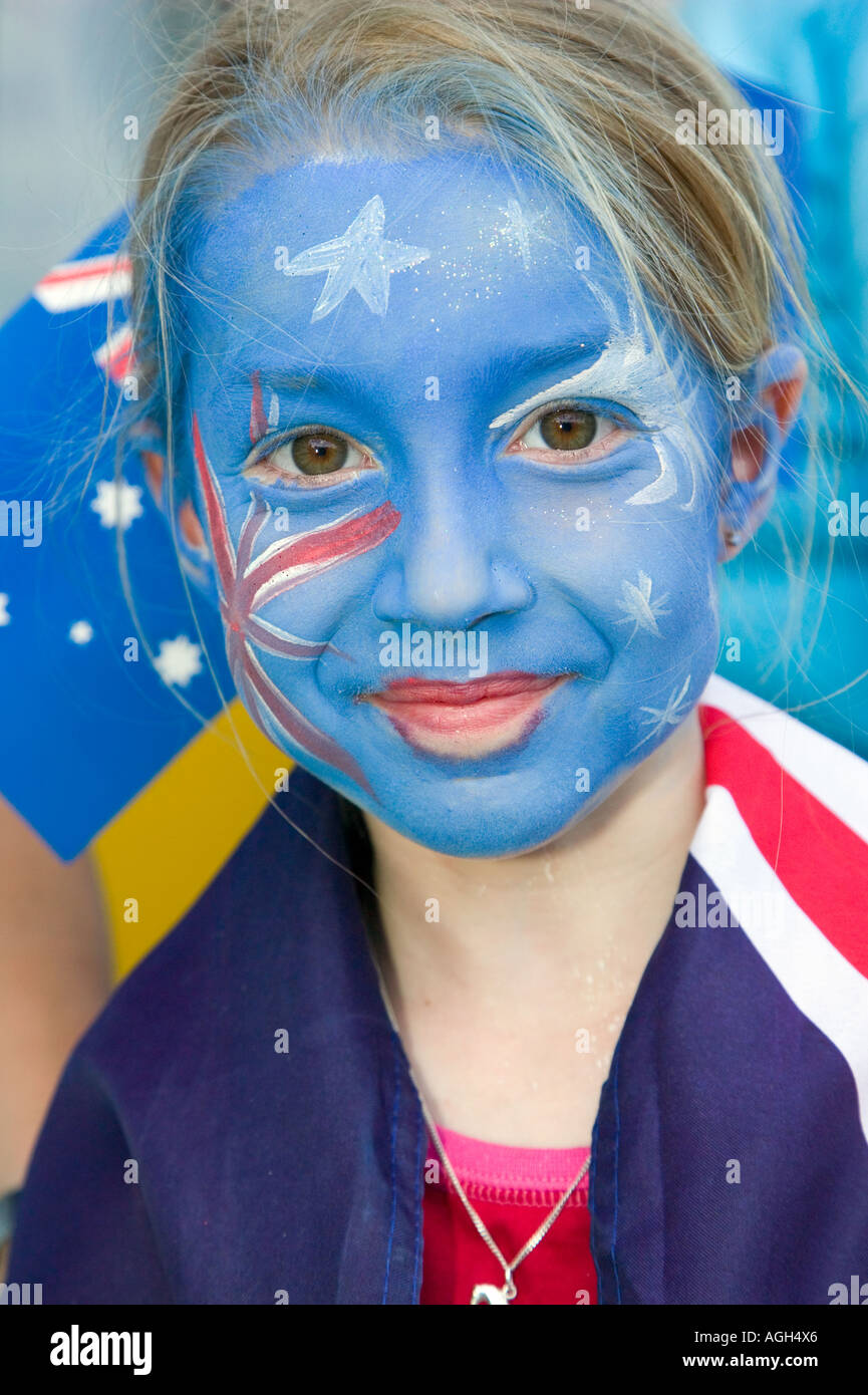 Portrait of a smiling young Australian girl with an Australian flag ...