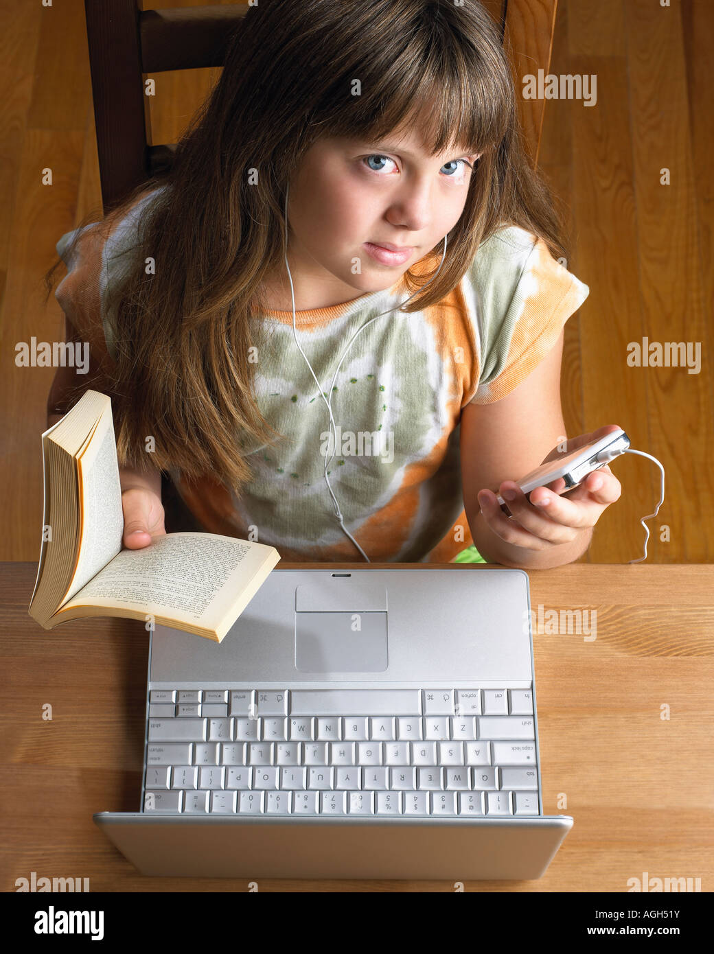 Girl multitasking between new and old technologies Stock Photo - Alamy