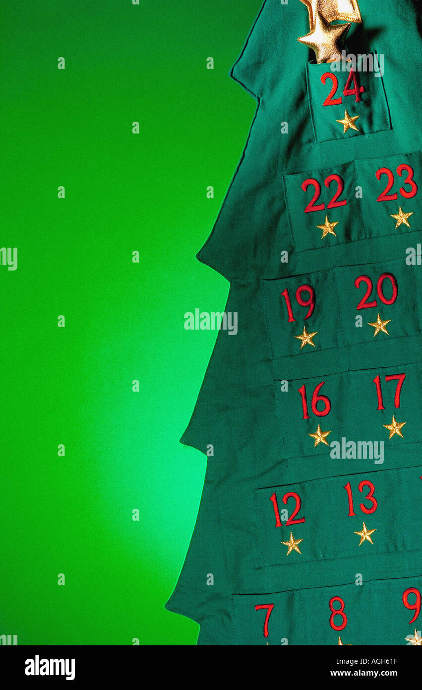 Section of fabric Christmas advent calendar in the shape of a tree ...